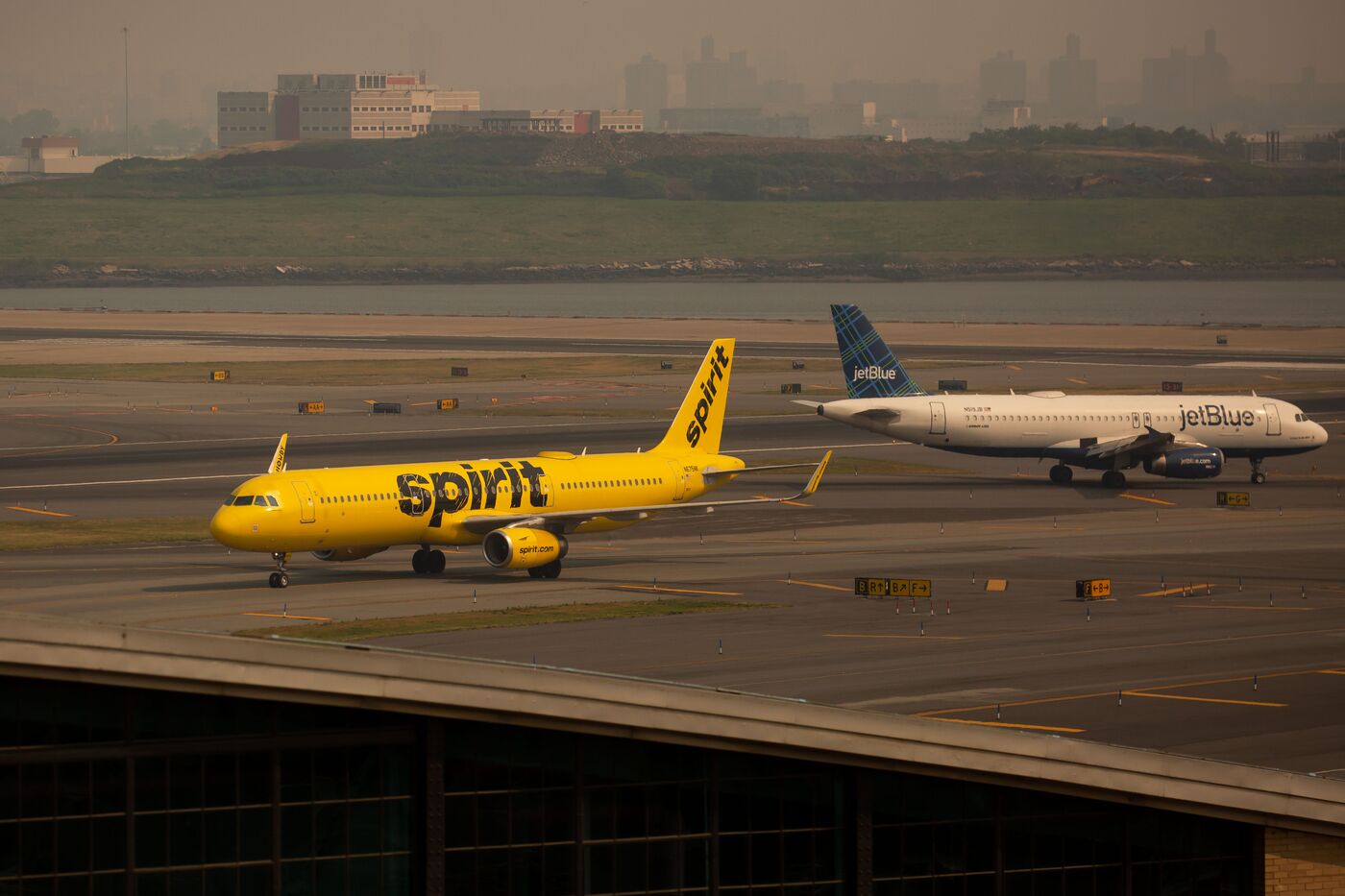 JetBlue-Spirit Merger Trial Tests US Crackdown on Airline Deals - Bloomberg