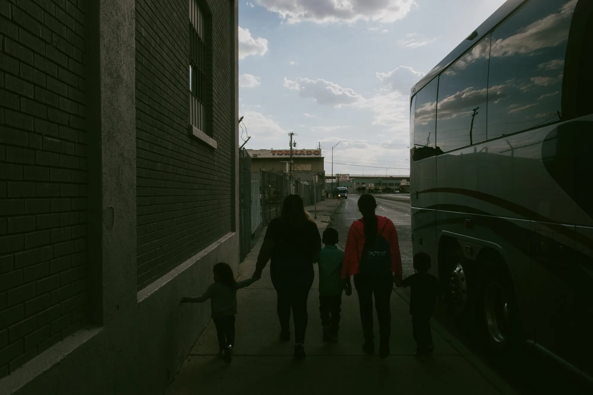 Biden Administration Defends Migrant Parole Program in Court - Bloomberg