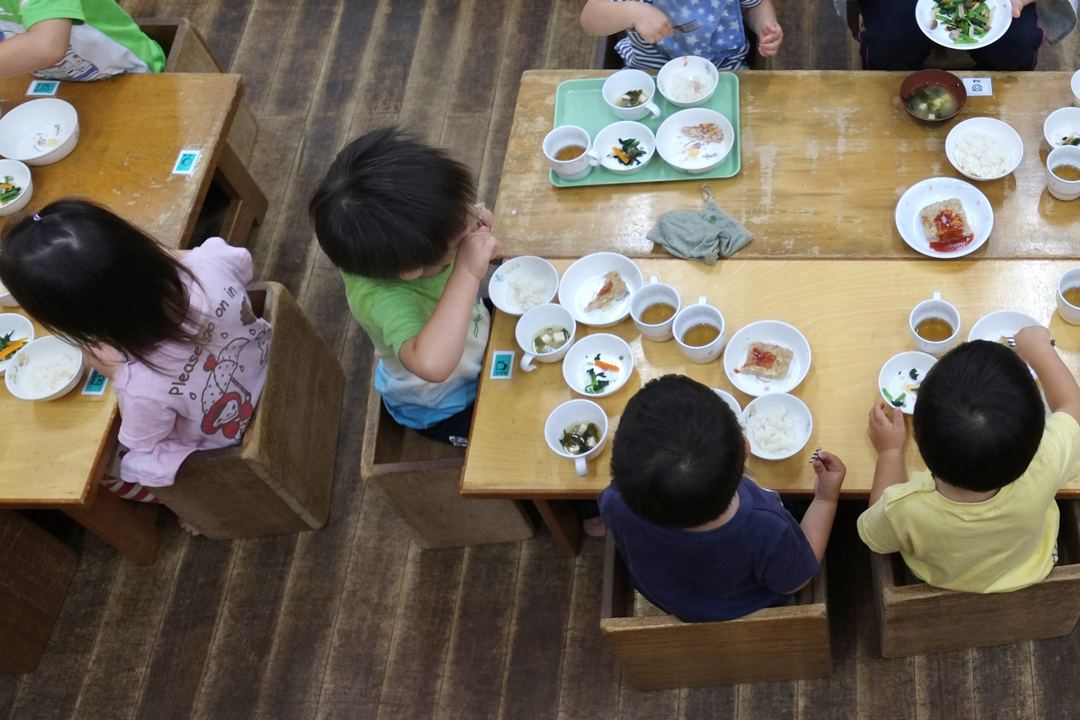 Japan’s Lower House Passes Bill to Fund Childcare Allowance - Bloomberg