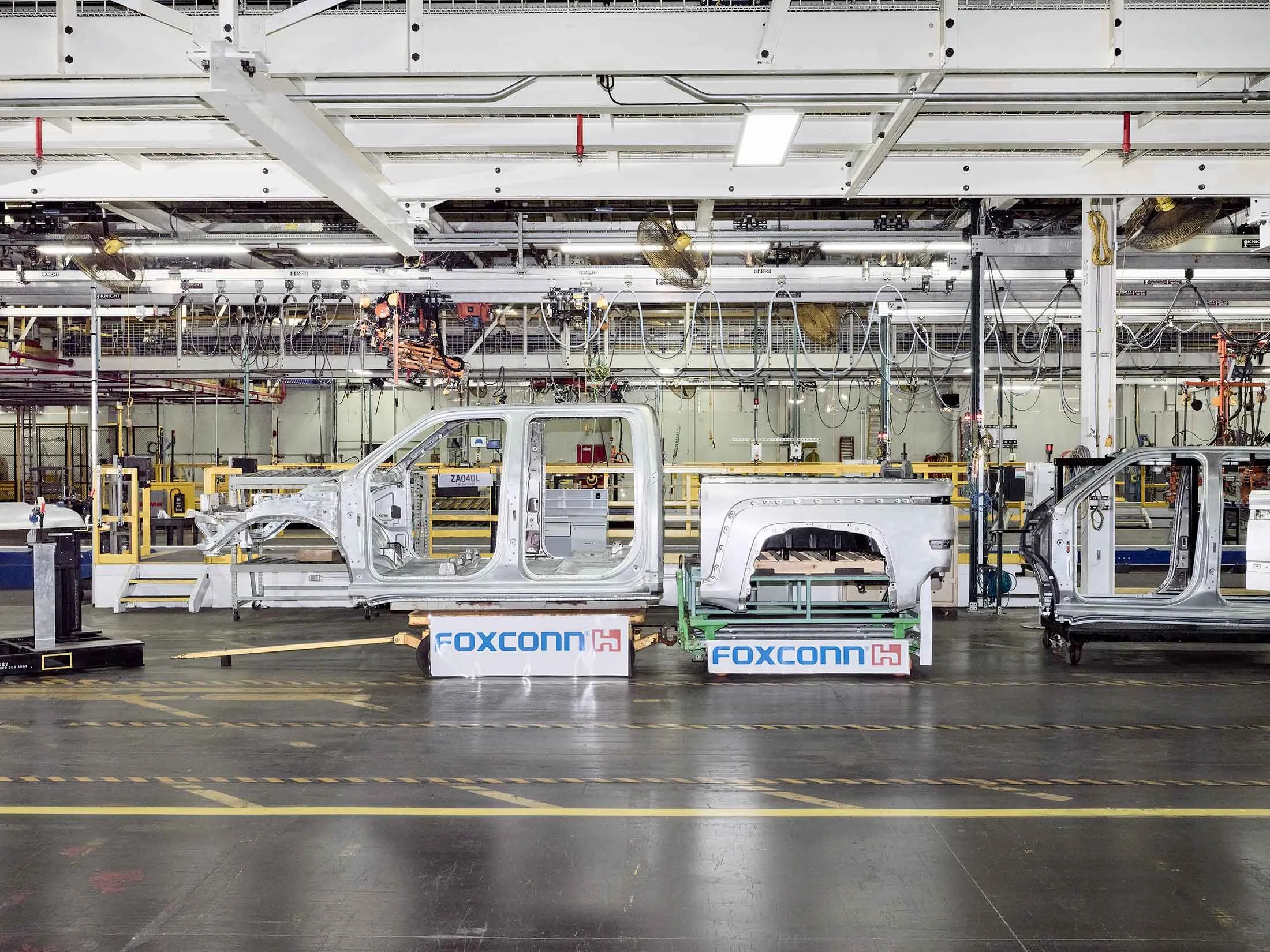 The Company That Made Your Phone Wants to Make Your EV, Too: Big Take ...