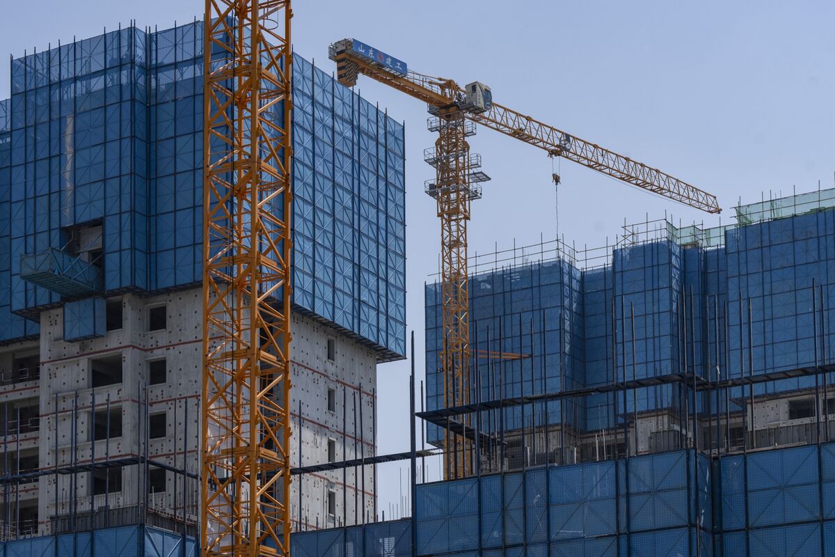 China Property Stocks Jumps on Government Proposal to Buy Unsold Homes ...