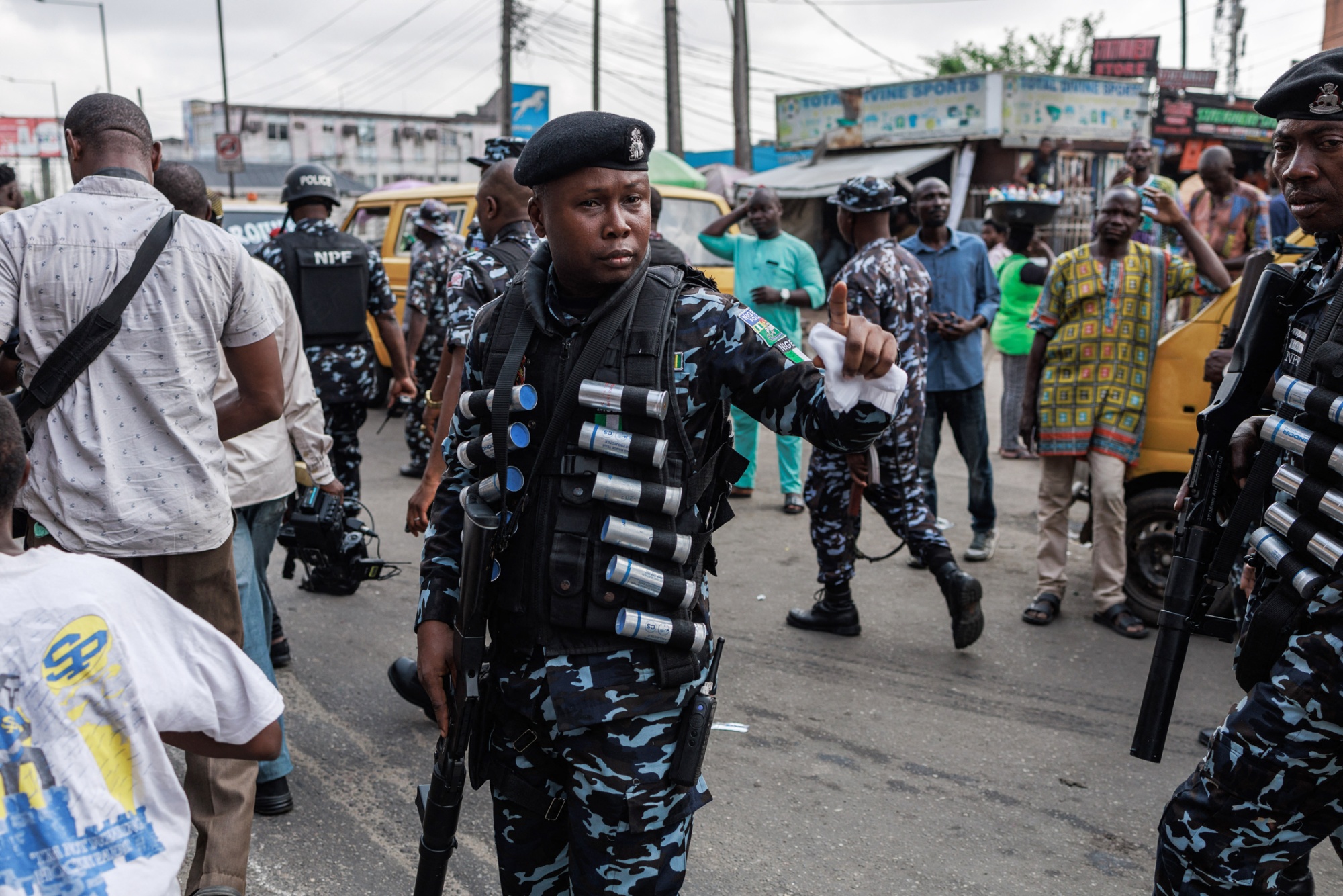 Nigeria Increases Pay for Police, Military as Inflation Surges - Bloomberg