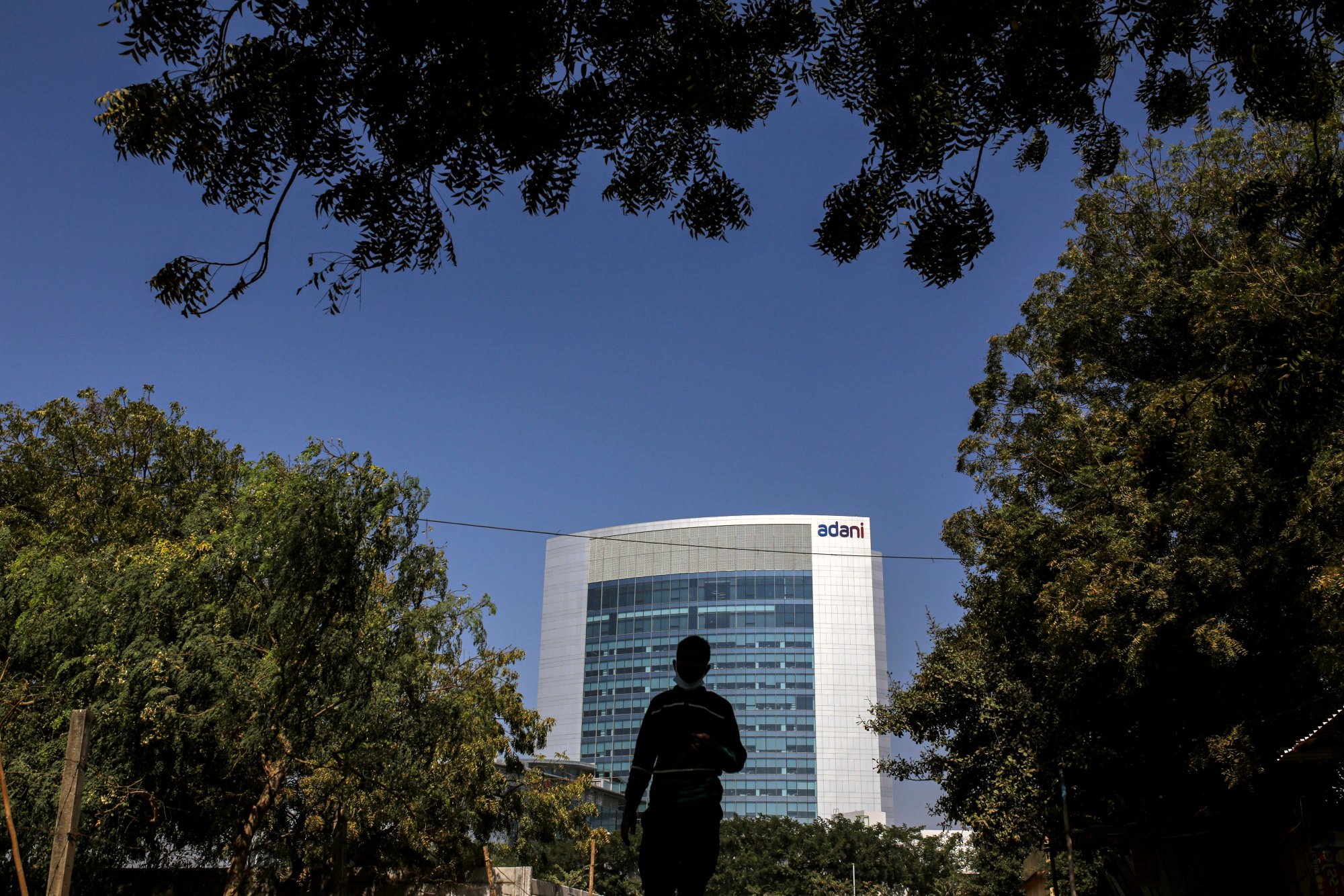 Adani Stocks Advance After Group Rebuts Debt Repayment Reports - Bloomberg