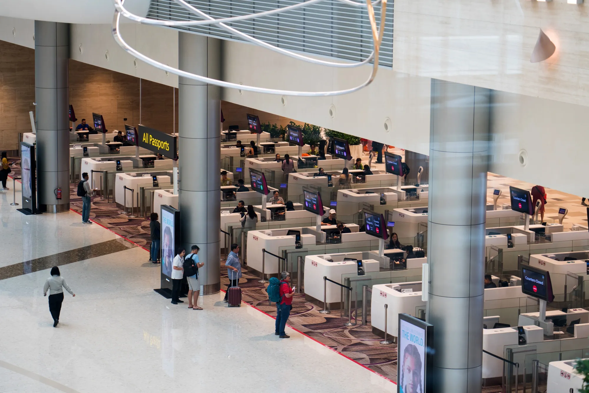 Singapore to Start Passport-Less Immigration Clearance - Bloomberg