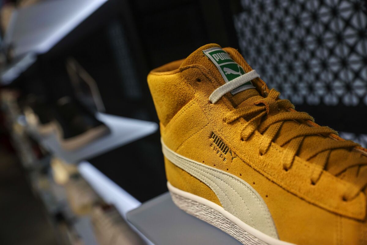 Puma Shares Plunge After New CEO Cuts Outlook on Weak Demand, Tariffs ...