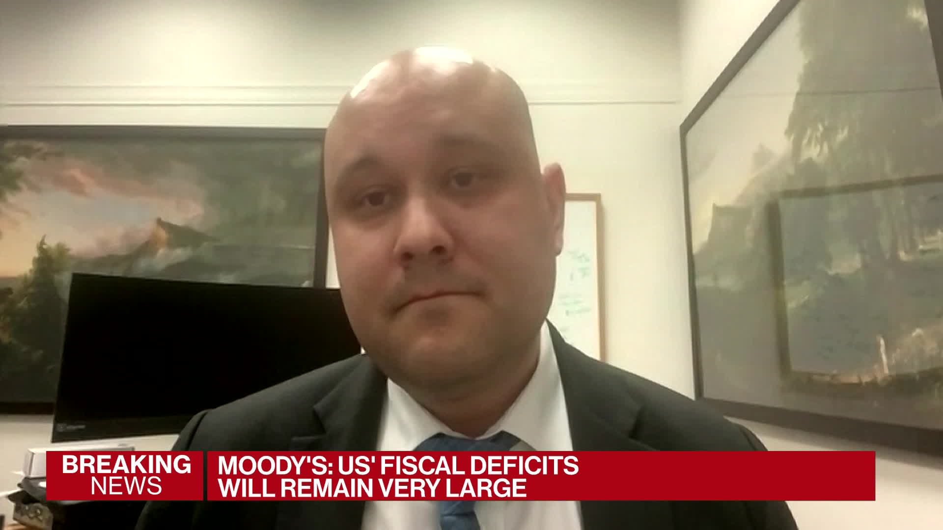 Watch Christopher Russo on Moody's Cutting US Outlook - Bloomberg