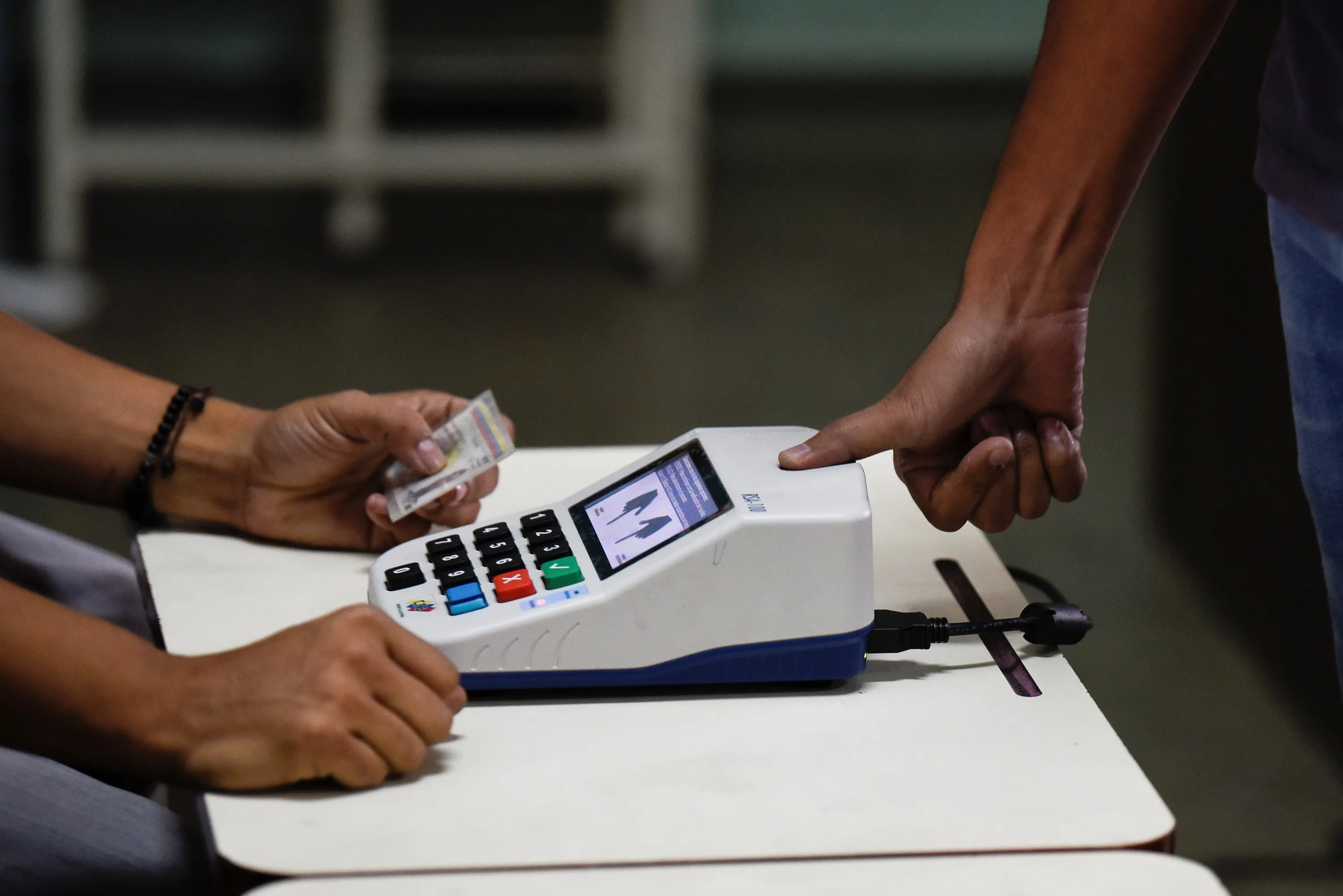 Warehouse Safeguarding Venezuelan Voting Machines Catches Fire - Bloomberg