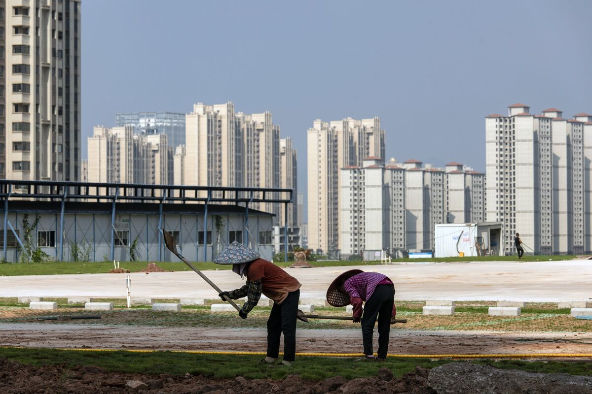 China Property Stocks Fall to 14-Year Low as Developer Credit Stress ...