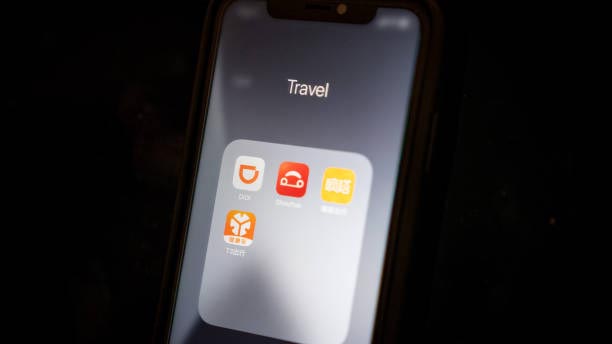 Didi Warns of ‘Adverse Impact’ After 25 Mobile Apps Removed - Bloomberg